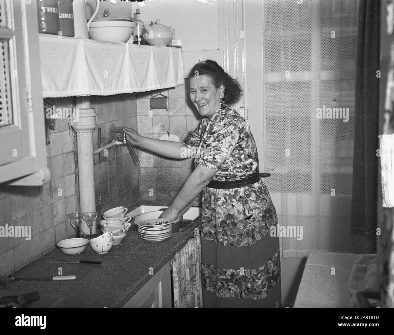 Mrs Whale falls over waranda, stays on foot Date: 26 September 1949 ...