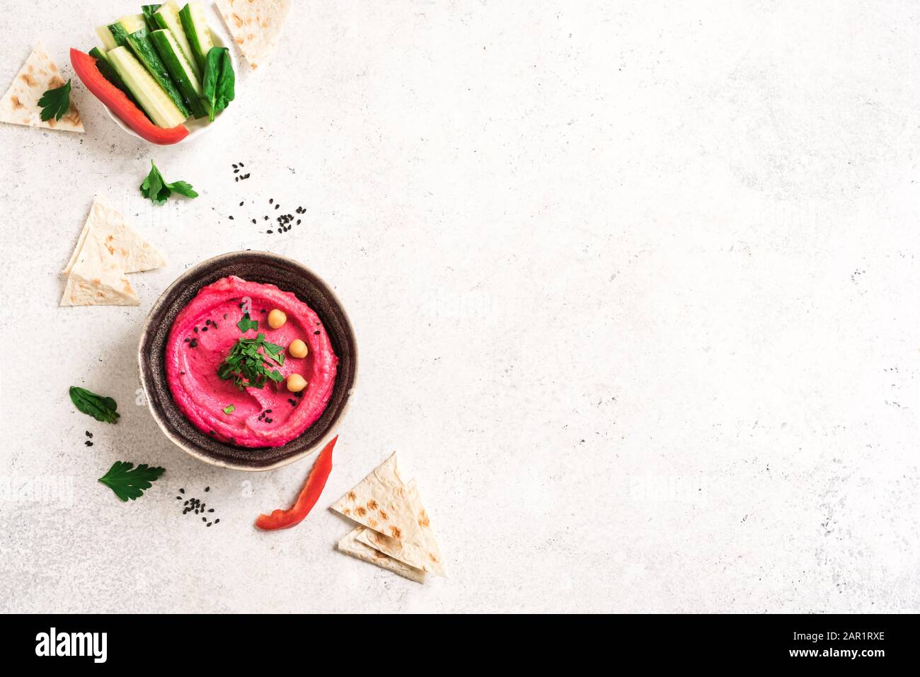Red Beetroot Hummus bowl, healthy vegan dip. Traditional Middle eastern ...