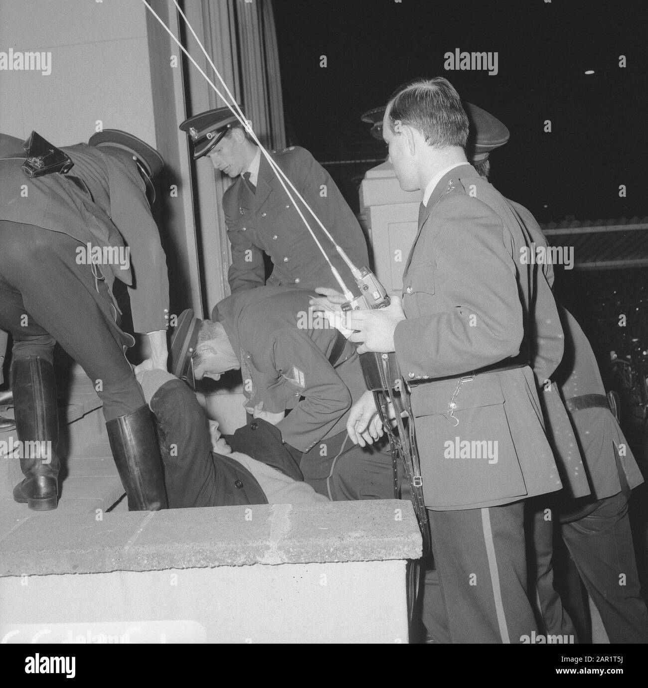 Group riot police control Black and White Stock Photos & Images - Alamy