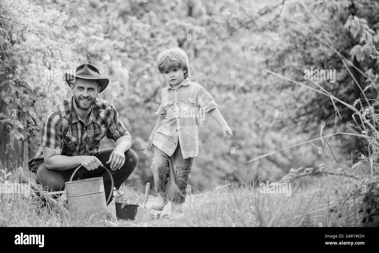 happy earth day. Family tree nursering. Eco farm. small boy child help ...