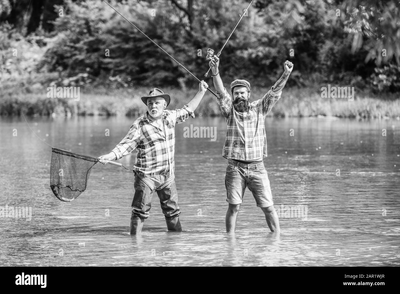 Bearded men catching fish. Master baiter. Mature man with friend ...