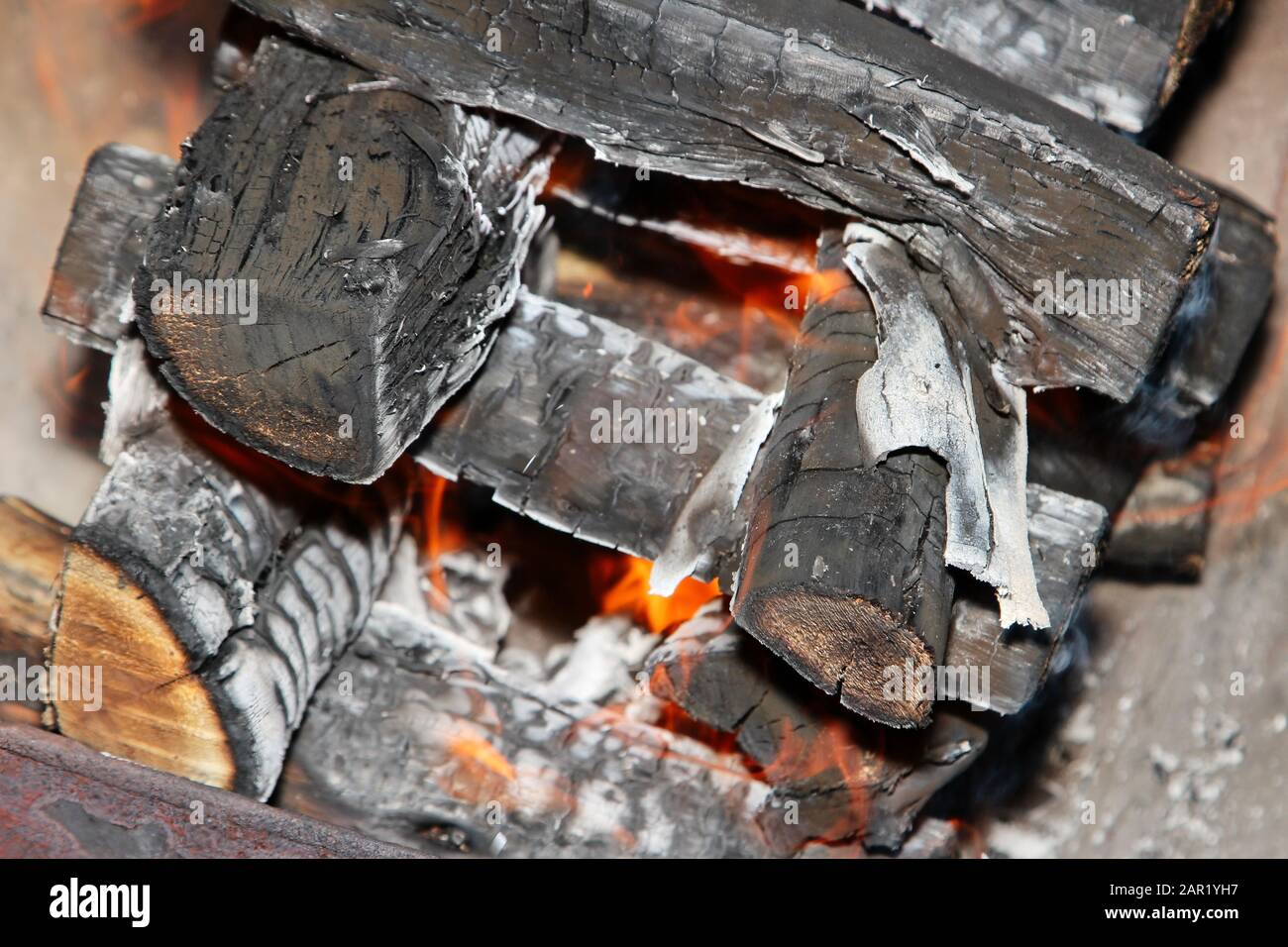 Closeup high angle shot of logs of wood burning in the fire Stock Photo ...