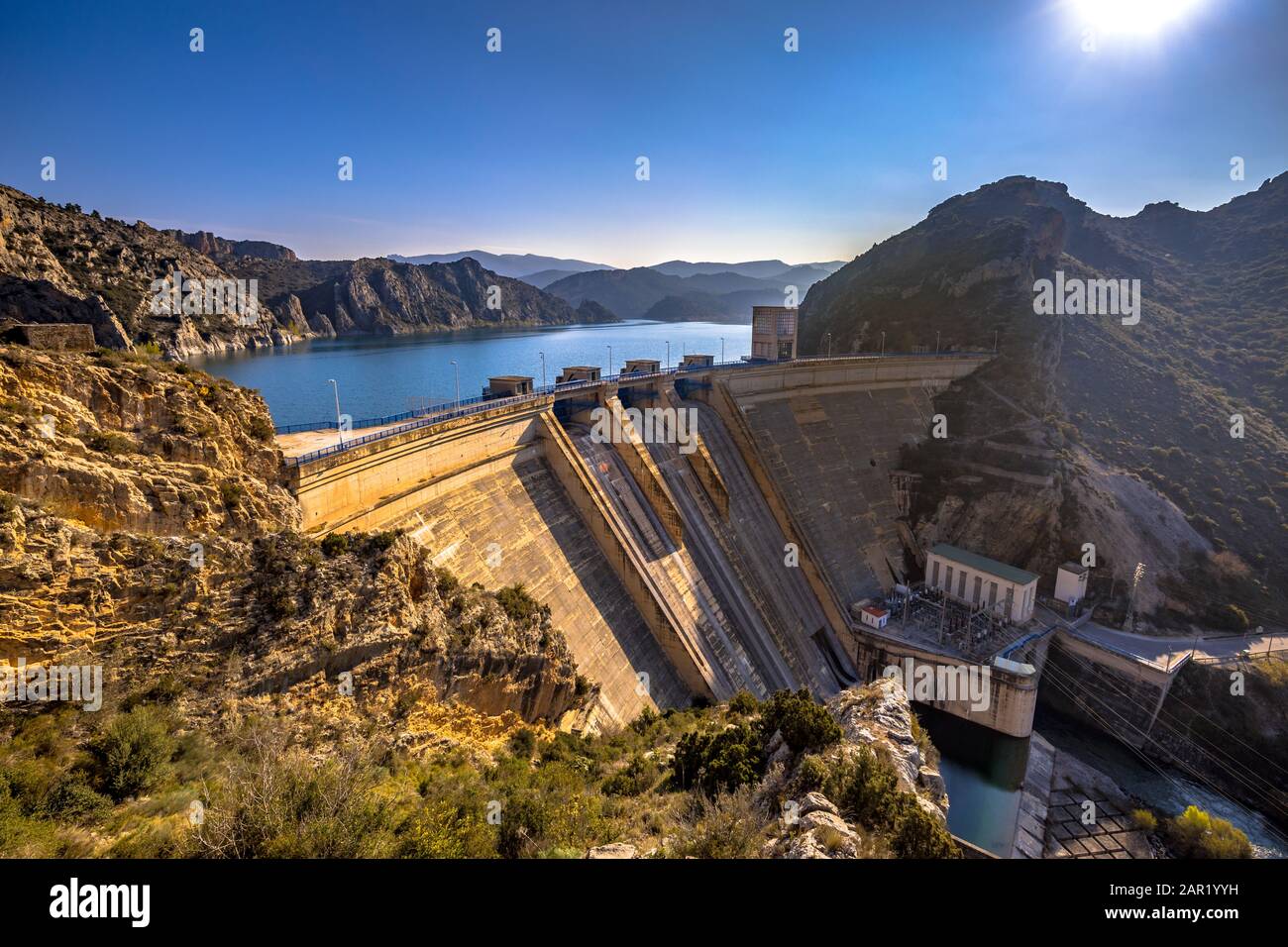 View of Hydroelectric dam at Embalse de Santa Ana reservoir lake in ...