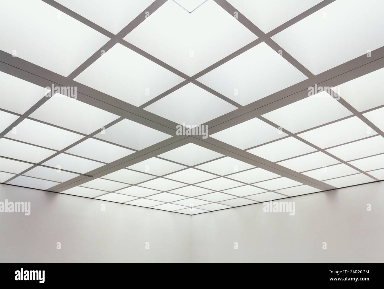 Low angle shot of the ceiling of a building made of square frames Stock ...