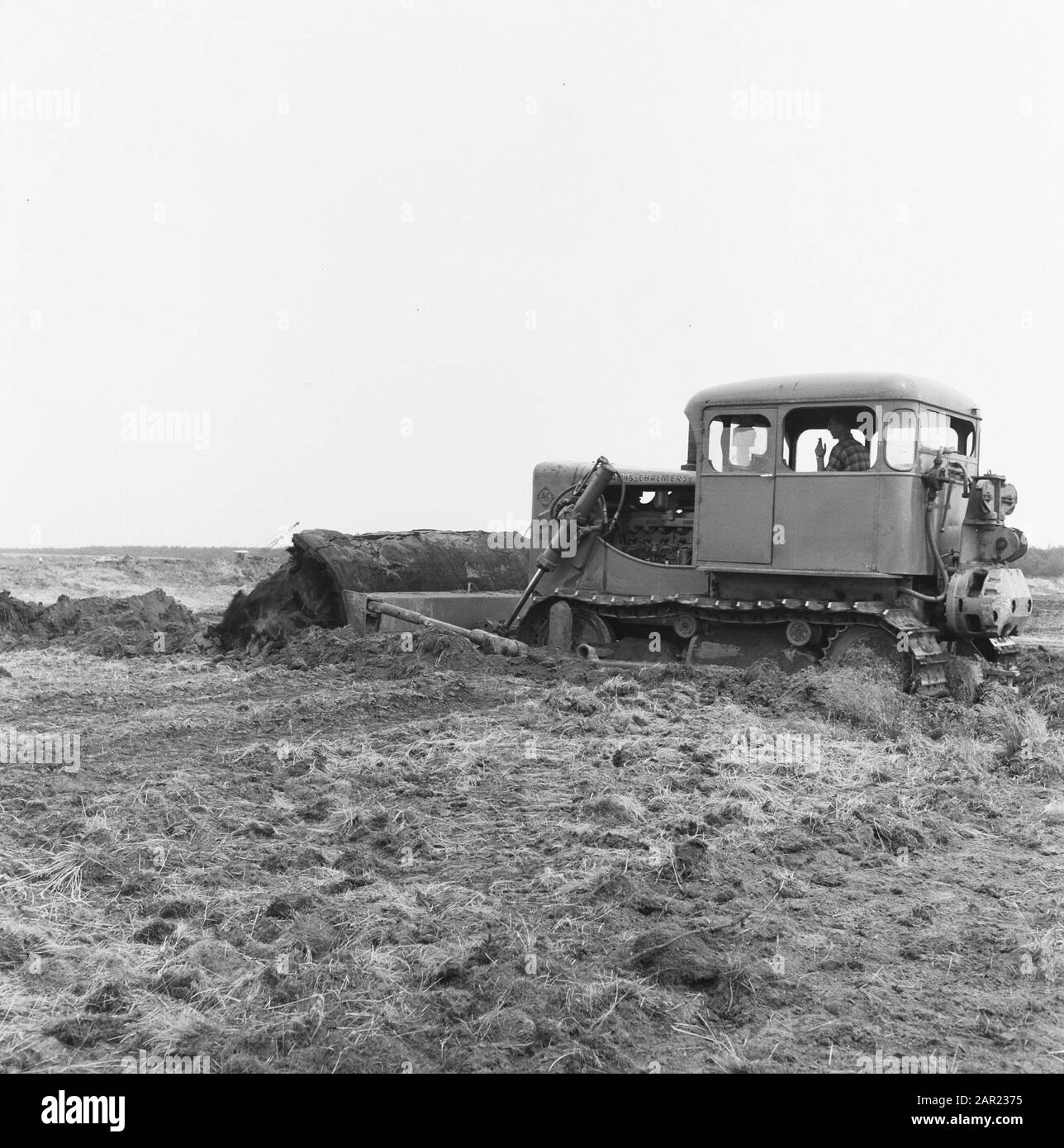 Bulldozer machine leveling construction site hi-res stock photography ...