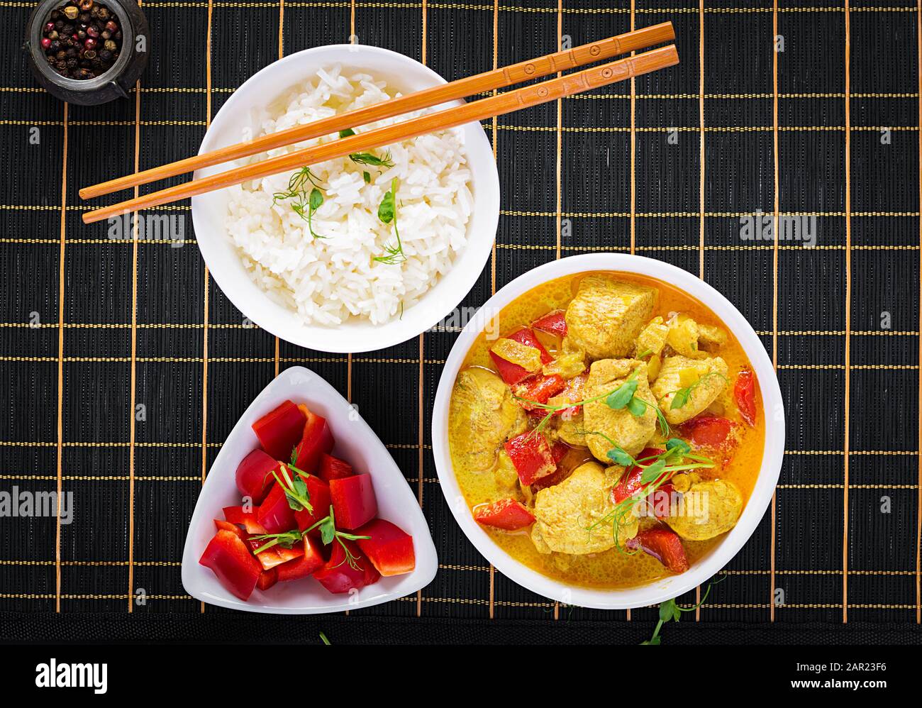 Indian chicken curry with basmati rice in bowl. Traditional Indian dish ...