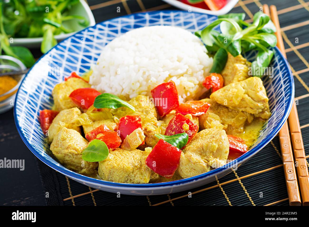 Indian Chicken Curry With Basmati Rice In Blue Bowl Traditional Indian