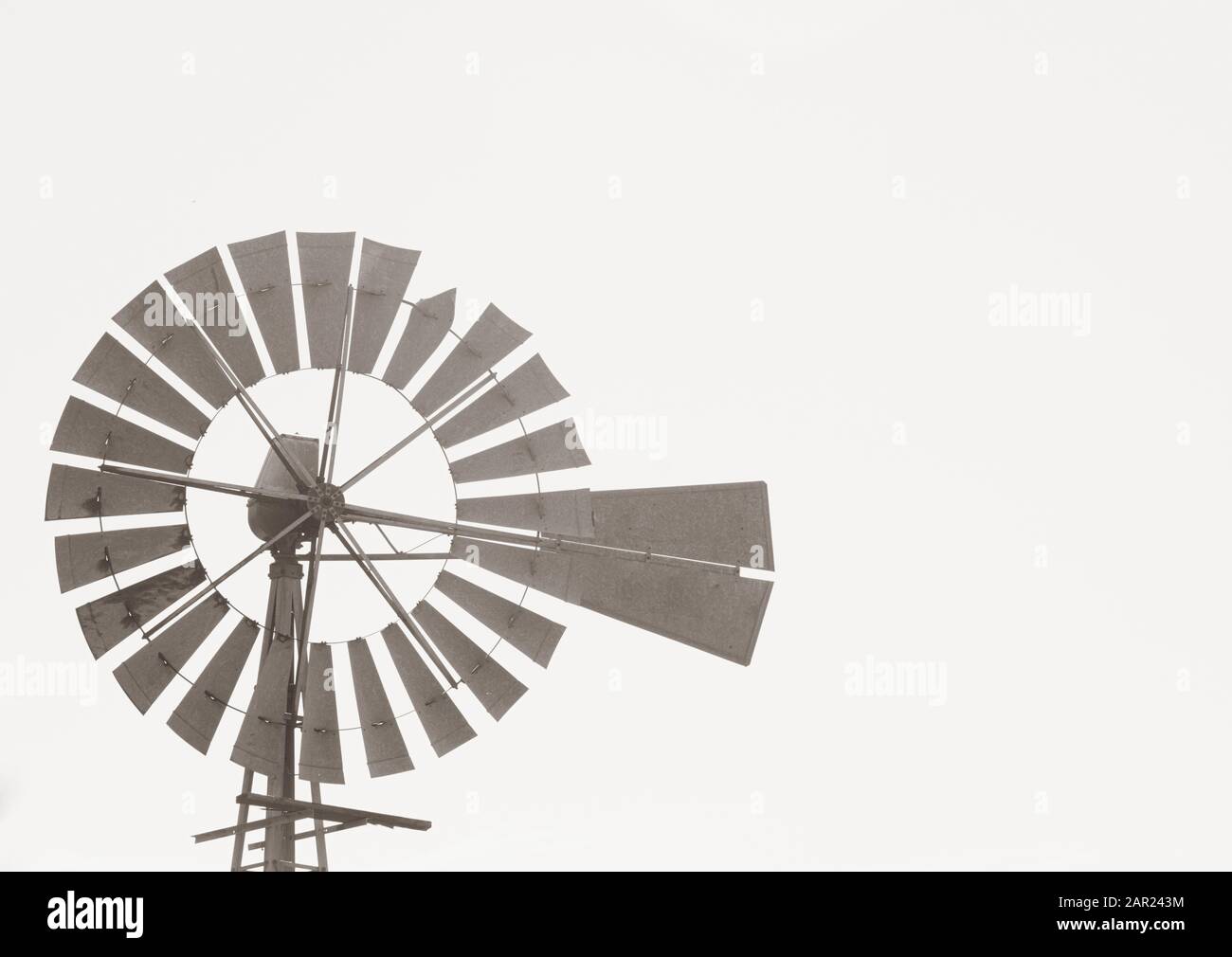 Close up of windmill turbine vintage technology sustainabe energy gray ...