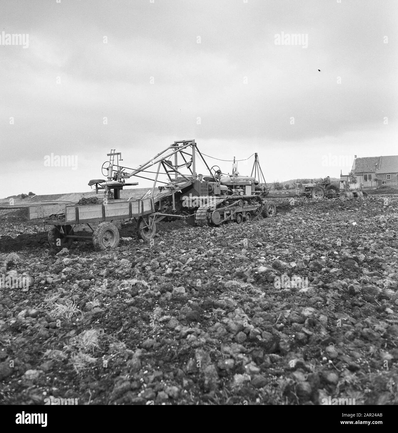 drainage, workers, machinery, wagons, pipes, peat molm Date: July 1957 ...