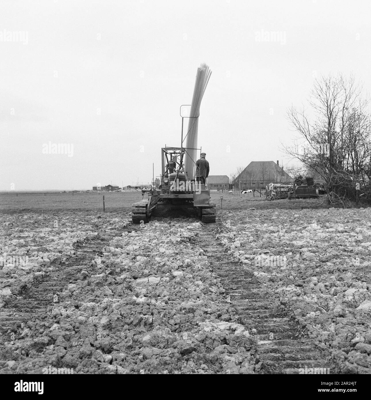 drainage, machinery, parts, workers Date: undated Keywords: workers ...