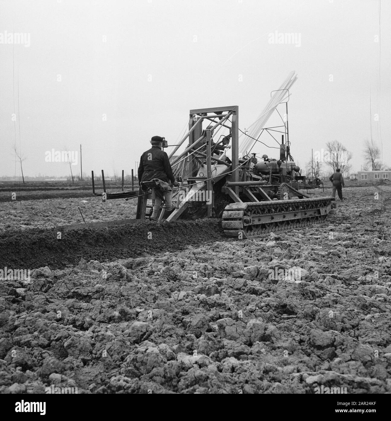 drainage, machinery, parts, workers Date: undated Keywords: workers ...