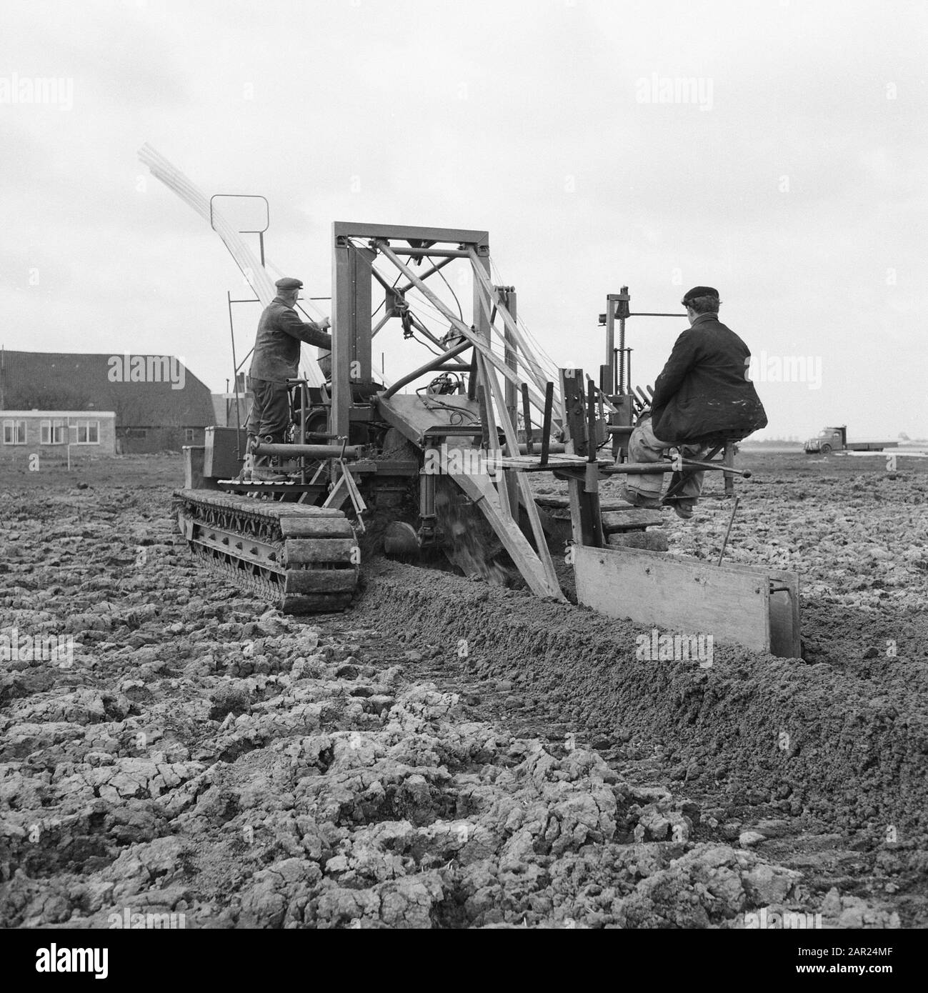 drainage, machines, drains, plastic, workers Date: undated Keywords ...
