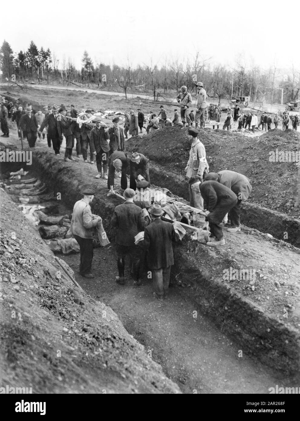 German People digging Graves for Mass Burial of Dead Prisoners at ...