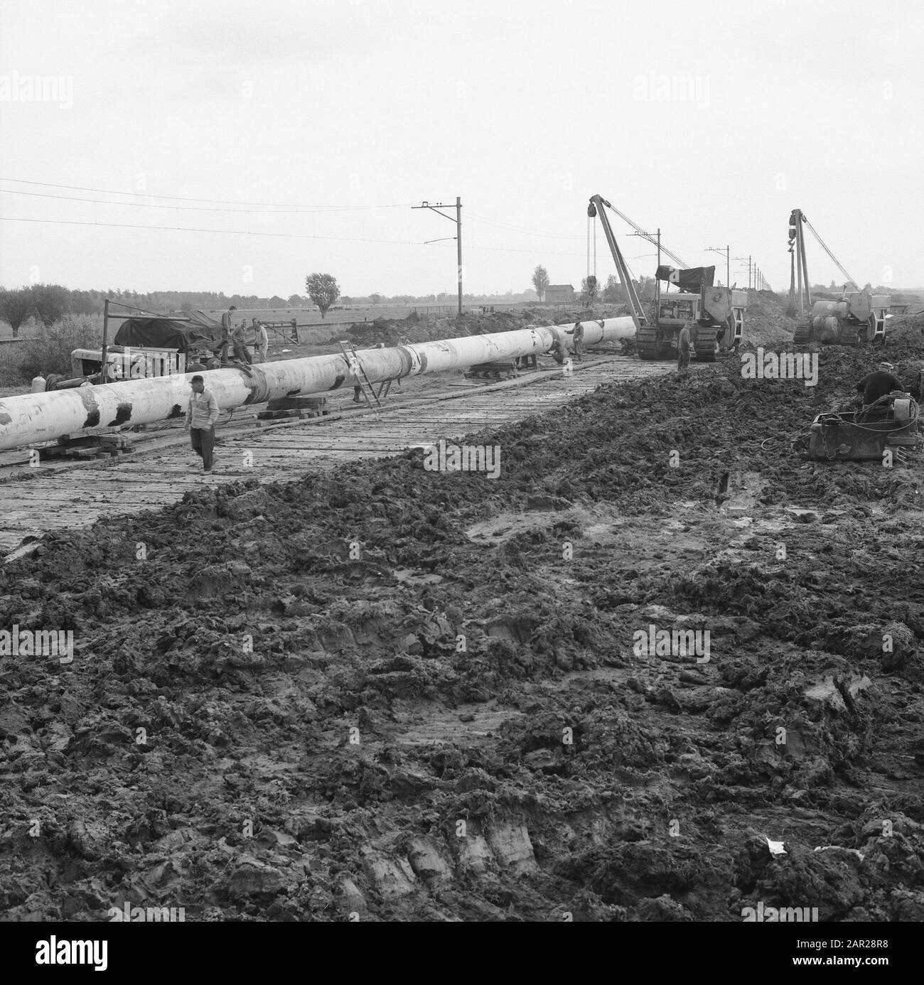 npc, pipelines, pipes, machines, workers, workfloors Date: 1965 ...