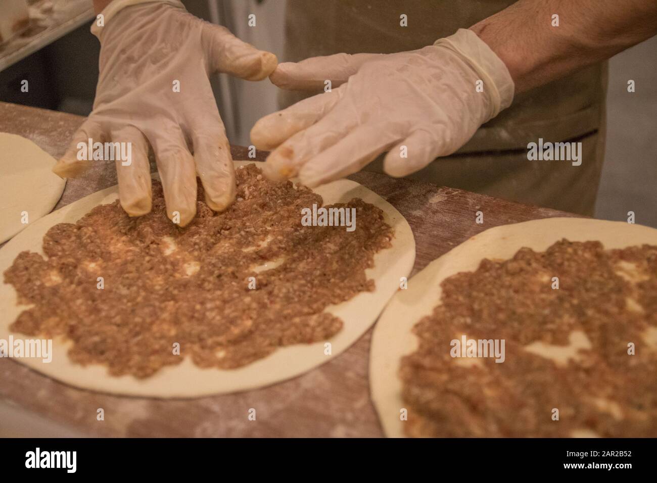 Pastry baking by arabian chef in Jordan Stock Photo - Alamy
