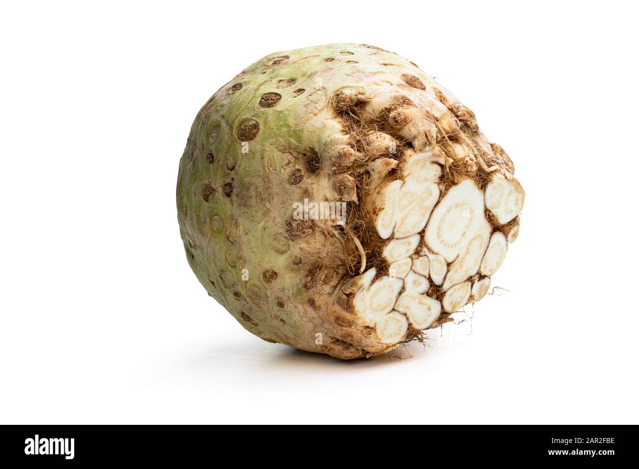 Fresh celery root isolated on white Stock Photo - Alamy