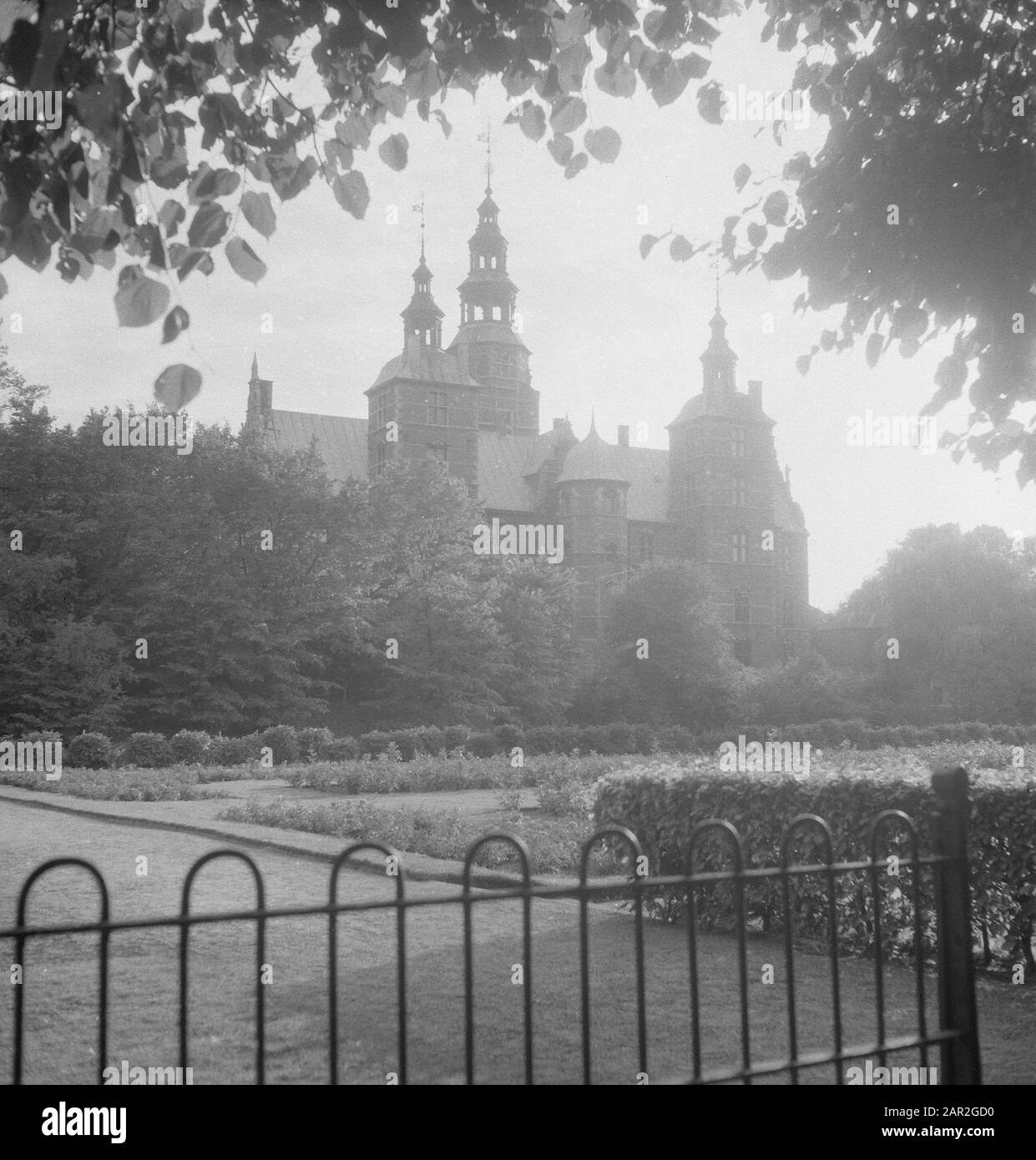 Hillerod. Slot Frederiksborg seen from the gardens in hazy weather Date ...