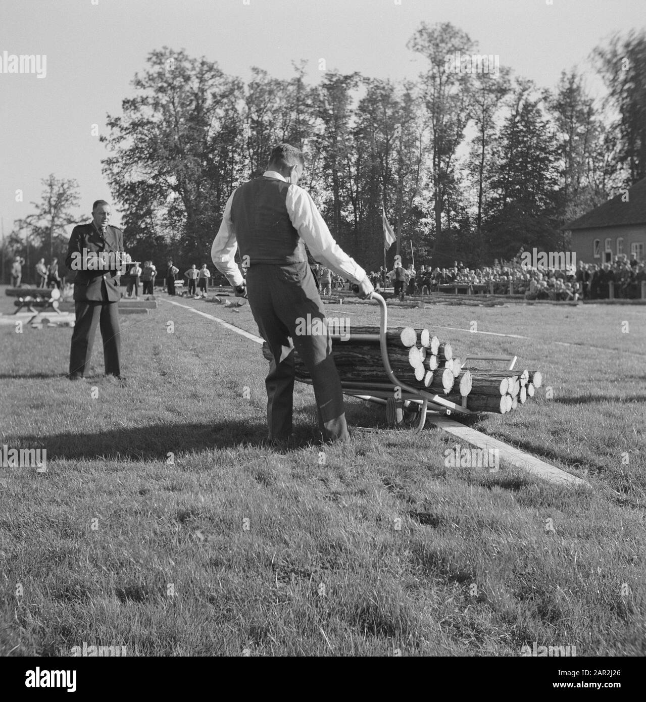 men, lawns, planks, wheelbarrows, tree trunks Date: undated Keywords ...