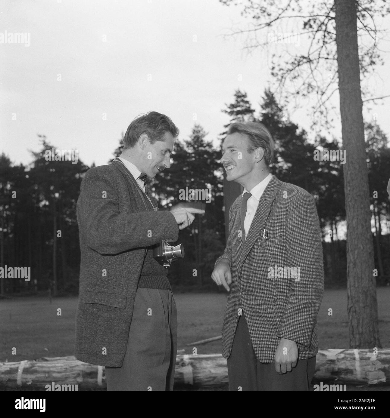 men, conversations, trees Date: undated Keywords: trees, conversations ...