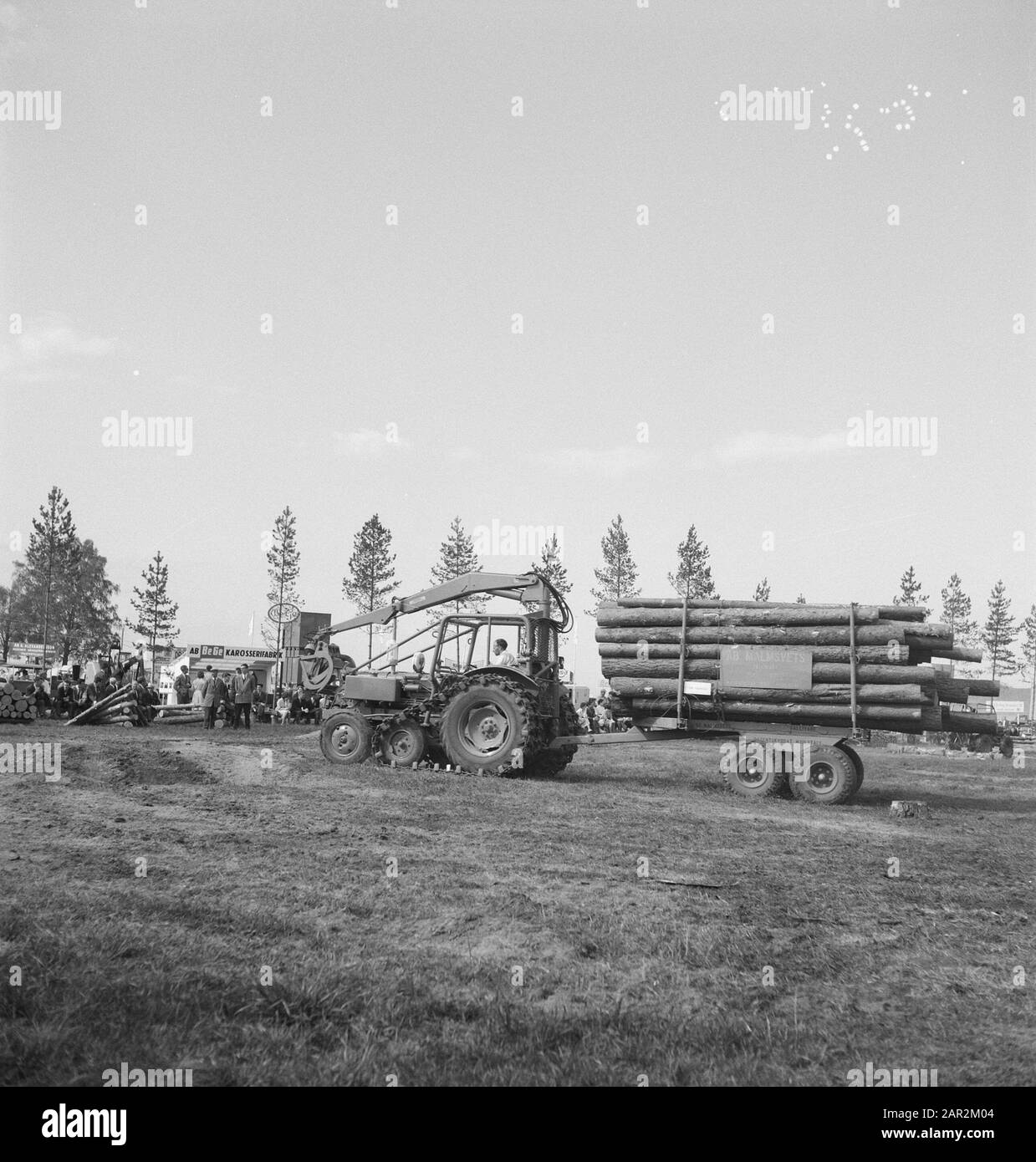 Log harvesting machine Black and White Stock Photos & Images - Alamy