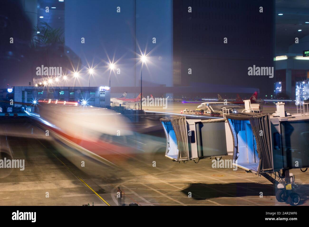airplane moving towards the plane Stock Photo - Alamy