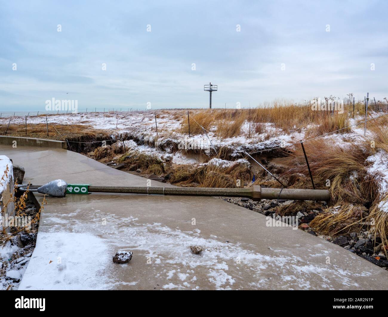 Wave and storm surge damage with fallen light pole. Montrose Point ...