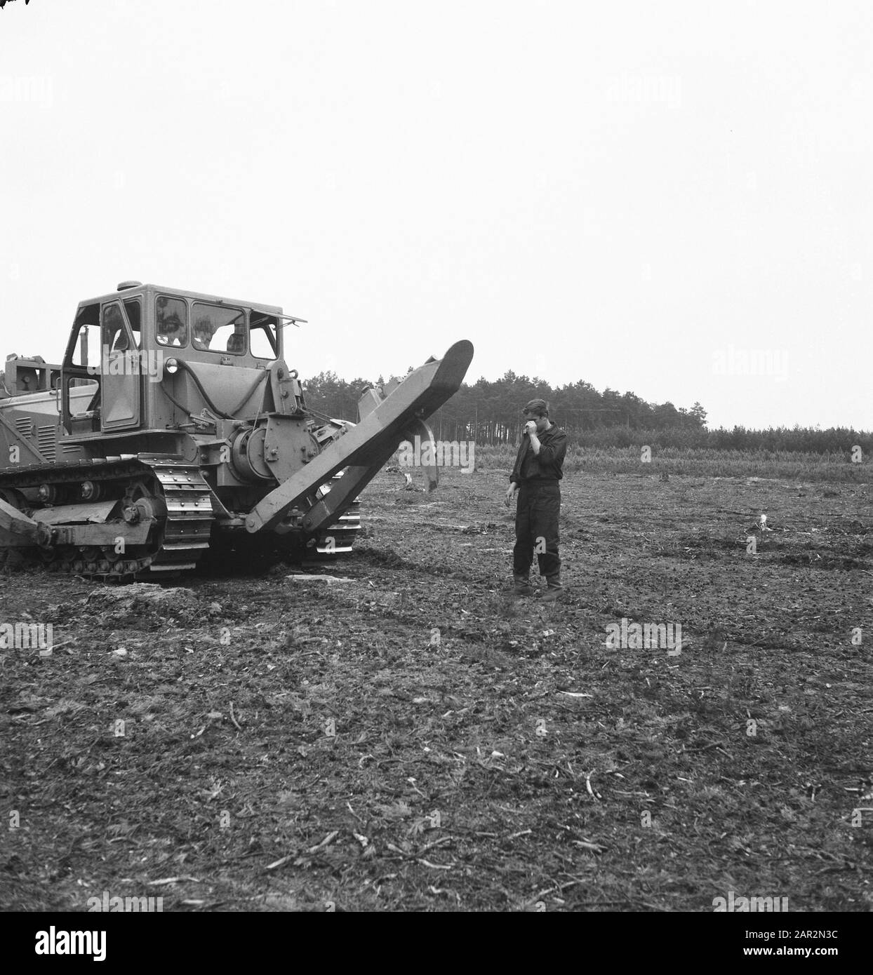 machines, tools, terrain, workers Date: undated Keywords: workers ...