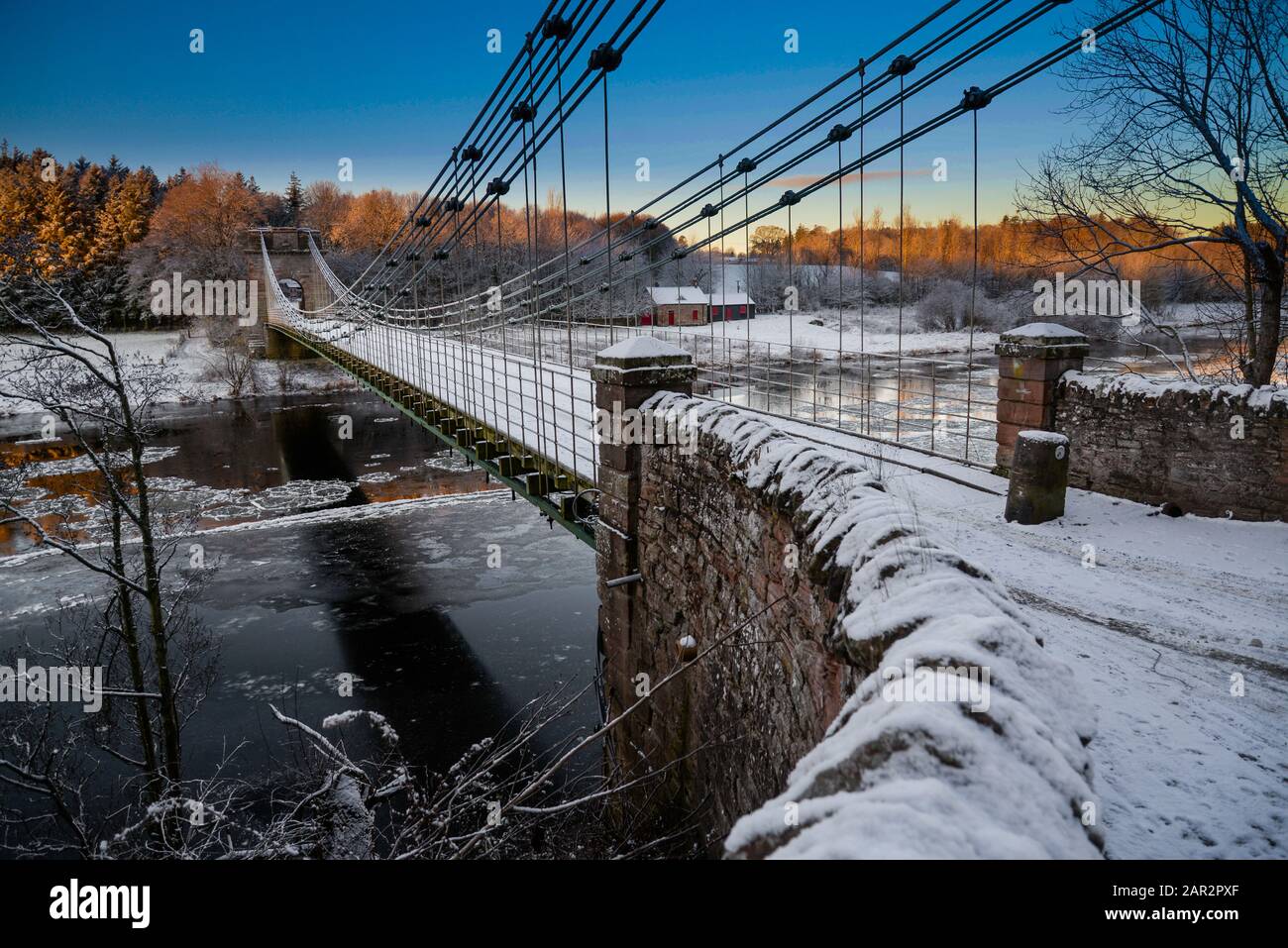 Winter at the Union Chain Bridge crossing the Tweed linking England and ...