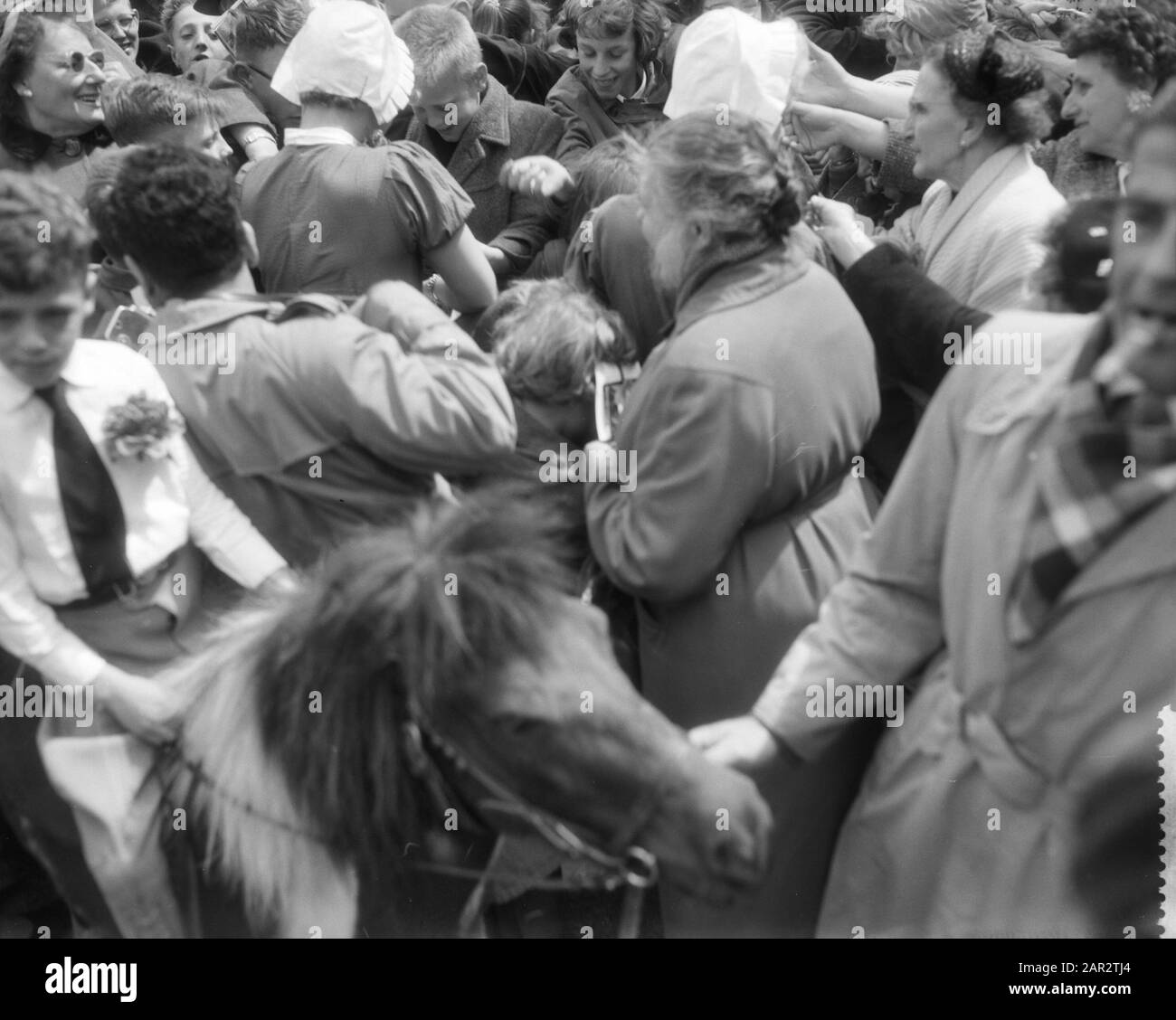 Girls in traditional costumes in Haarlem at invitation of Stichting ...