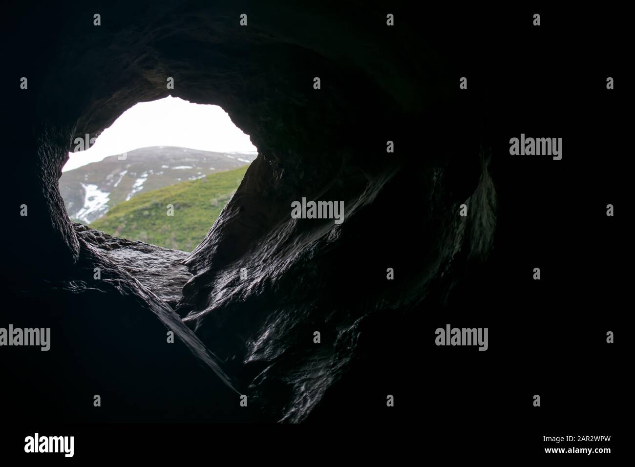 light hole in the mountain Stock Photo - Alamy