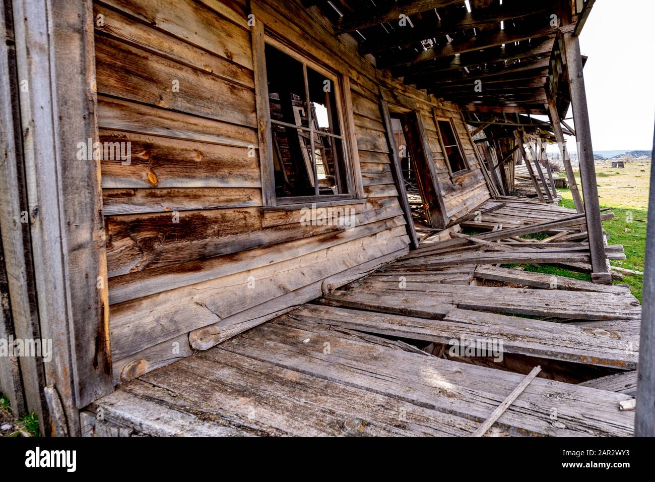 Gravity pulling an old building in a wild west town to the ground Stock ...