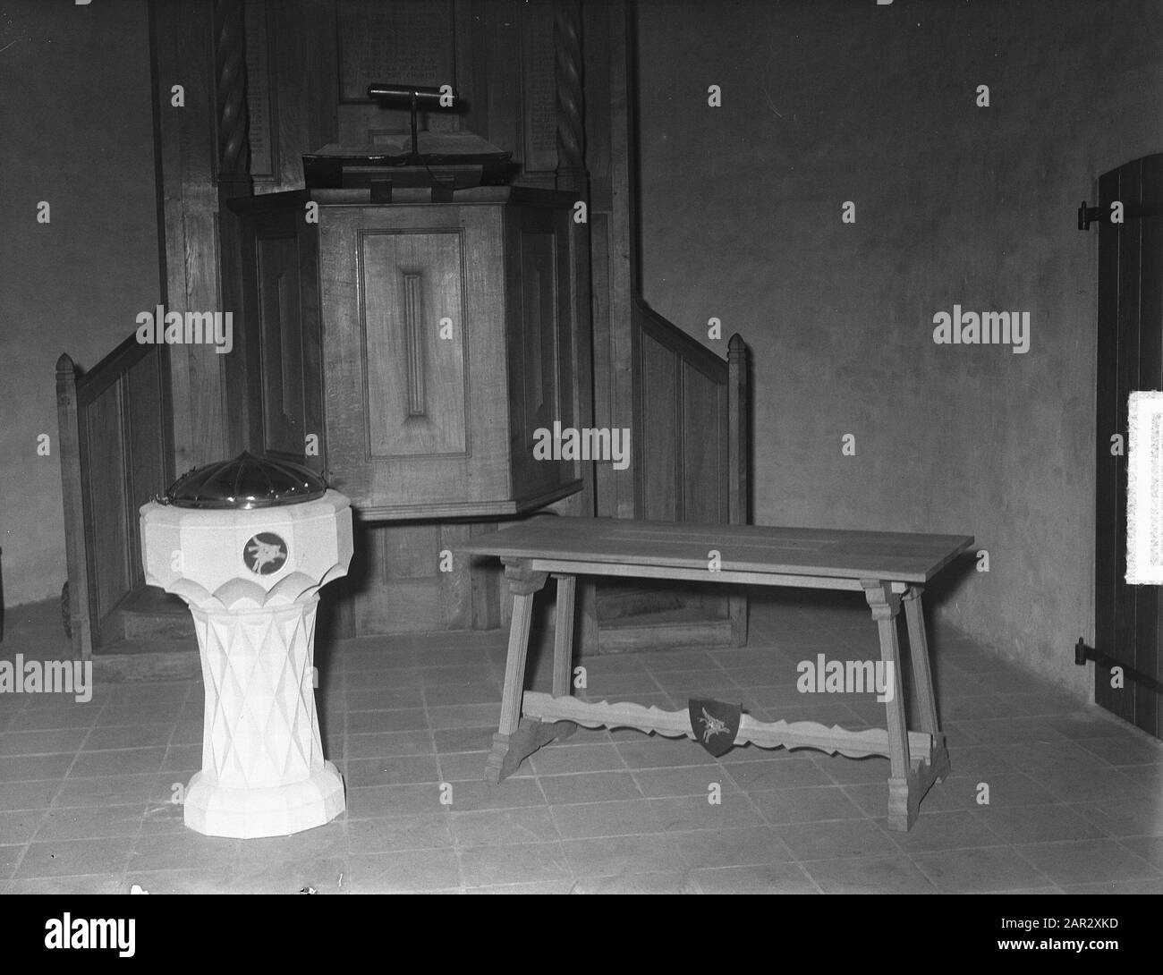 Baptismal font and dinner table in church at Oosterbeek Date: 8 ...