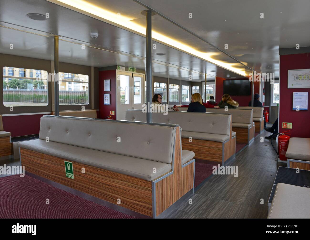 On board the Canary Wharf ferry service to Nelson Dock Pier on the ...