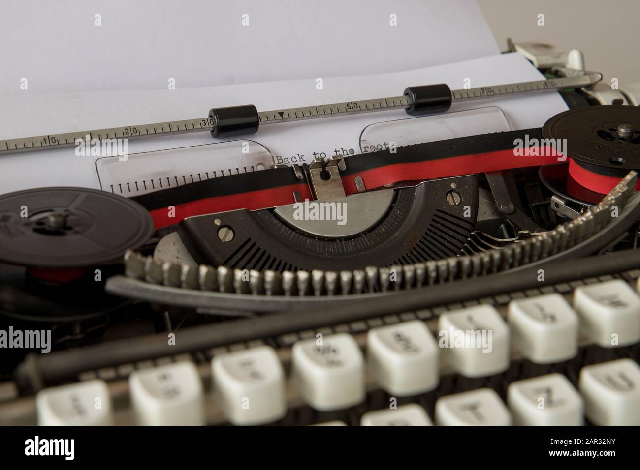 part of the keyboard of a typewriter with a sight inside the machine ...