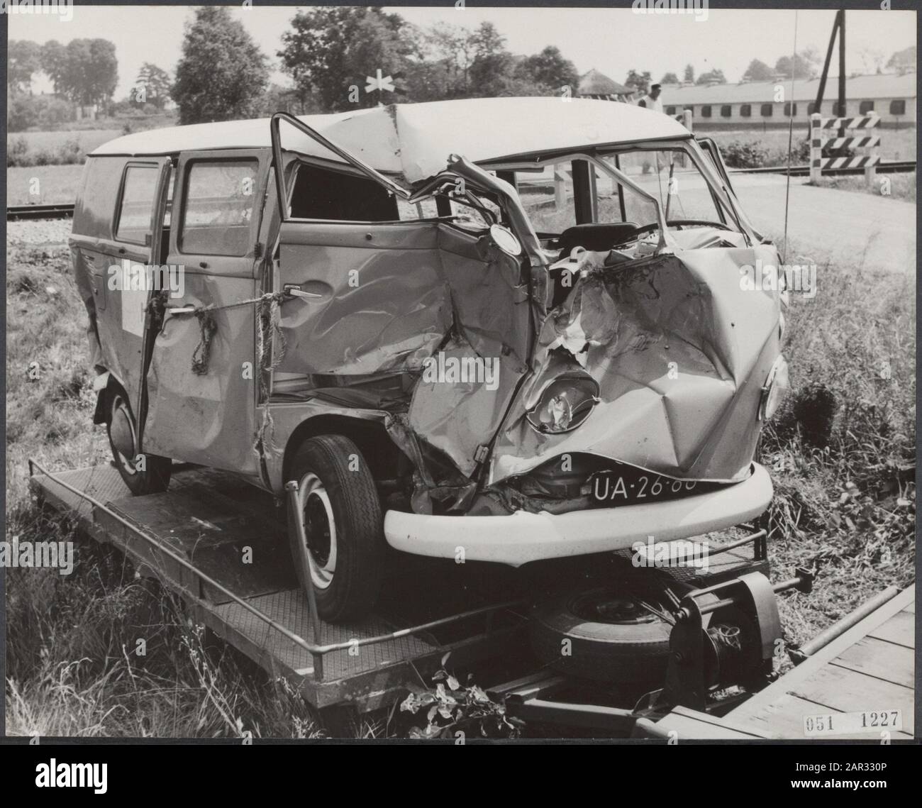 Wreck of a VW car van after a collision with a freight train on a ...