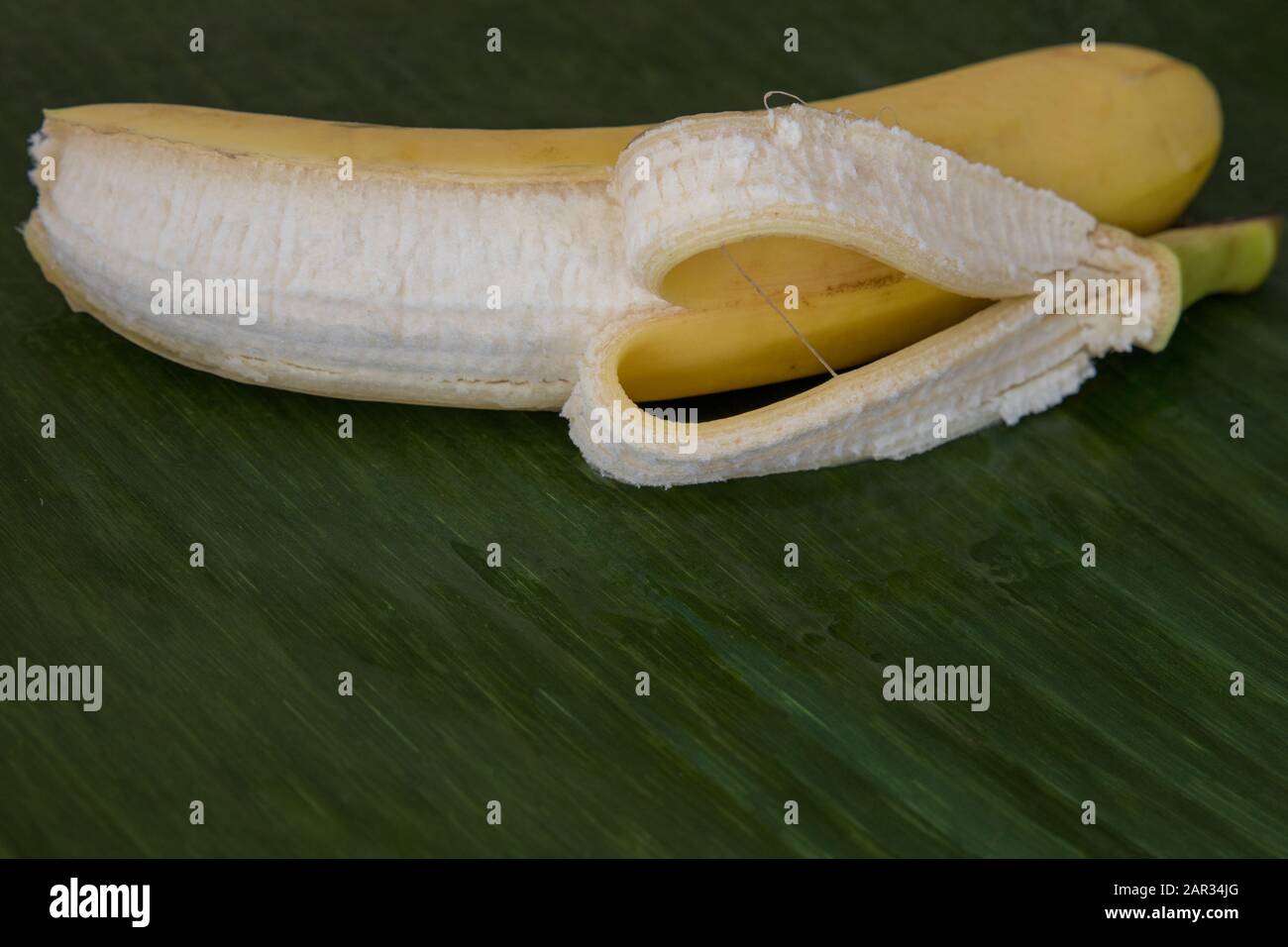 Open banana hi-res stock photography and images - Alamy