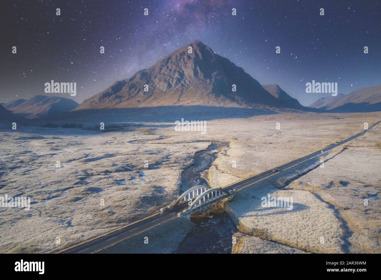 Buachaille Etive Mor at night during winter frost moor with stars in ...