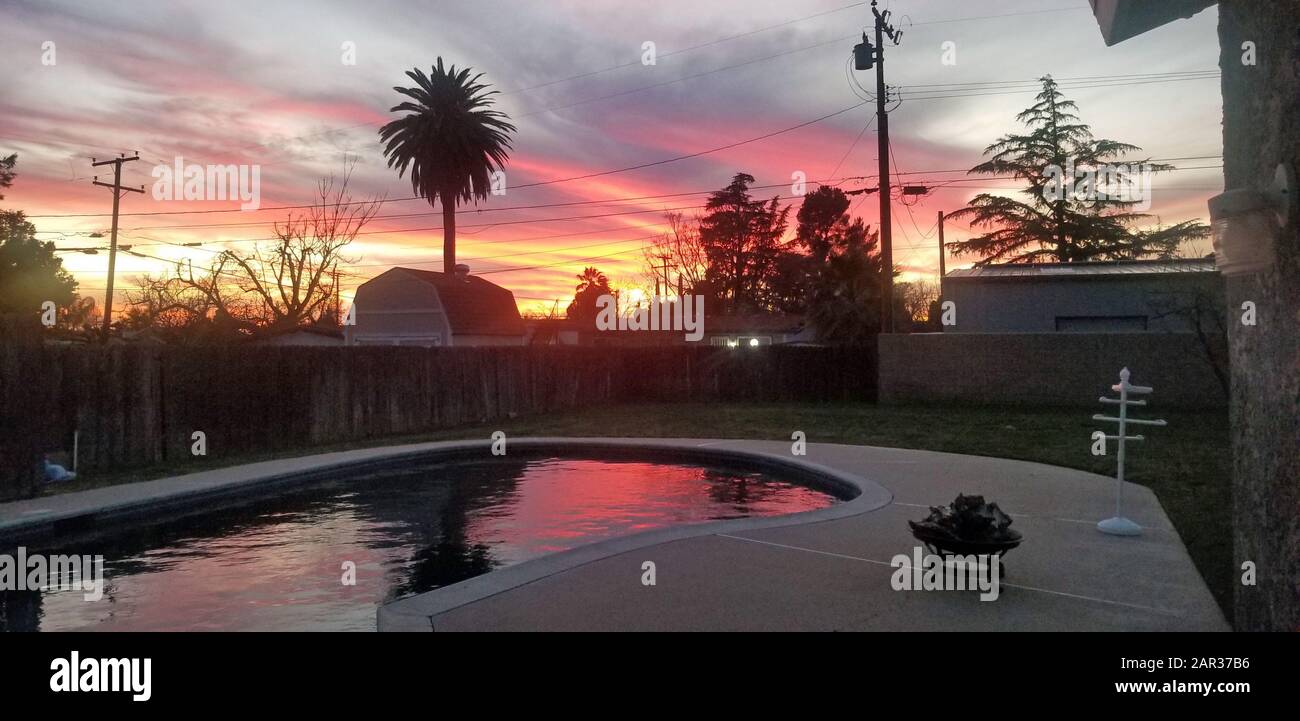 Sunset view from Pool Stock Photo - Alamy