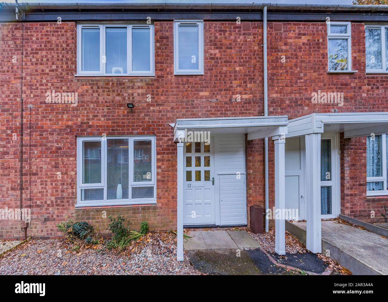 terraced house renovated Stock Photo - Alamy