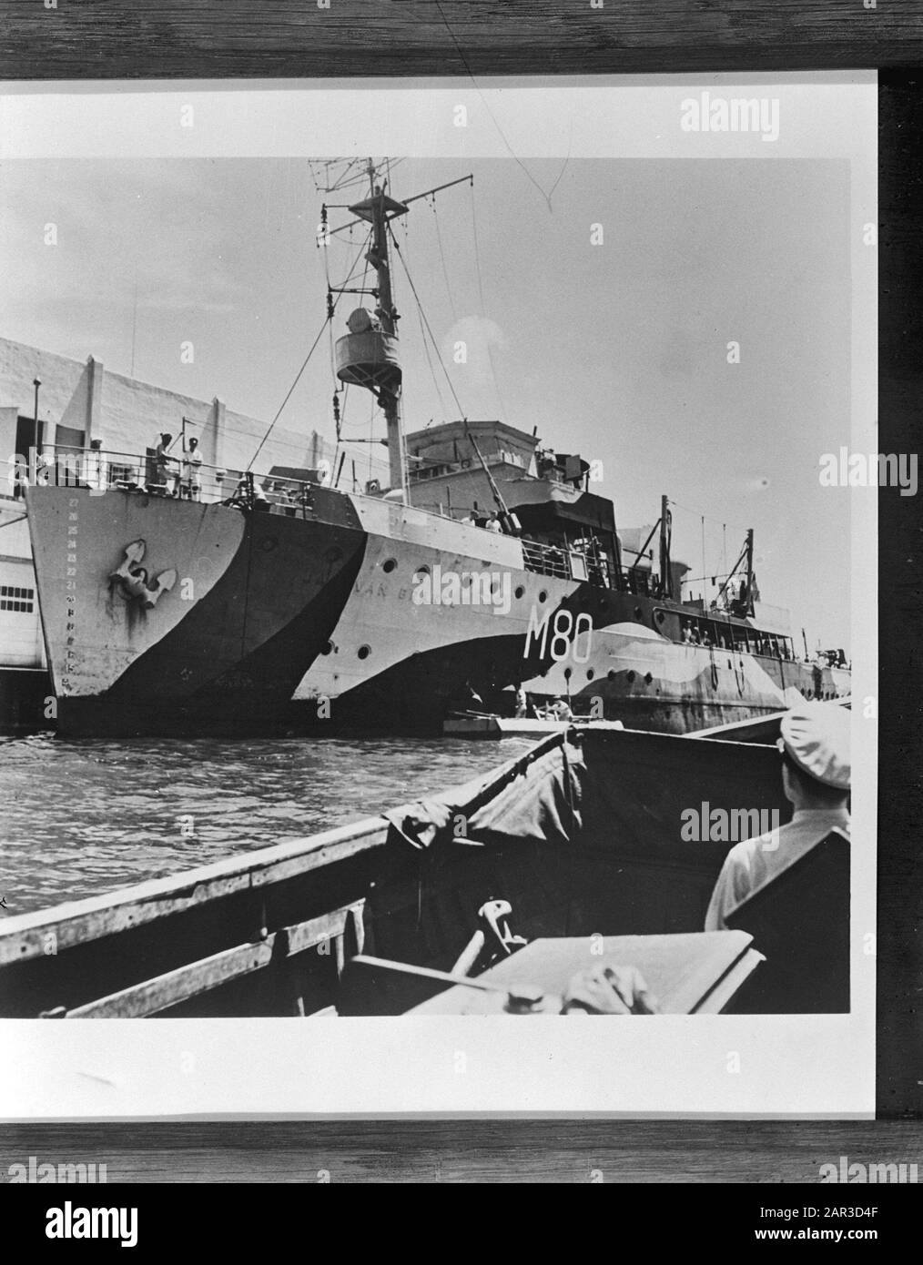 [Hr. Ms. Dan. Jan van Brakel in American port. Sailors approaching with ...