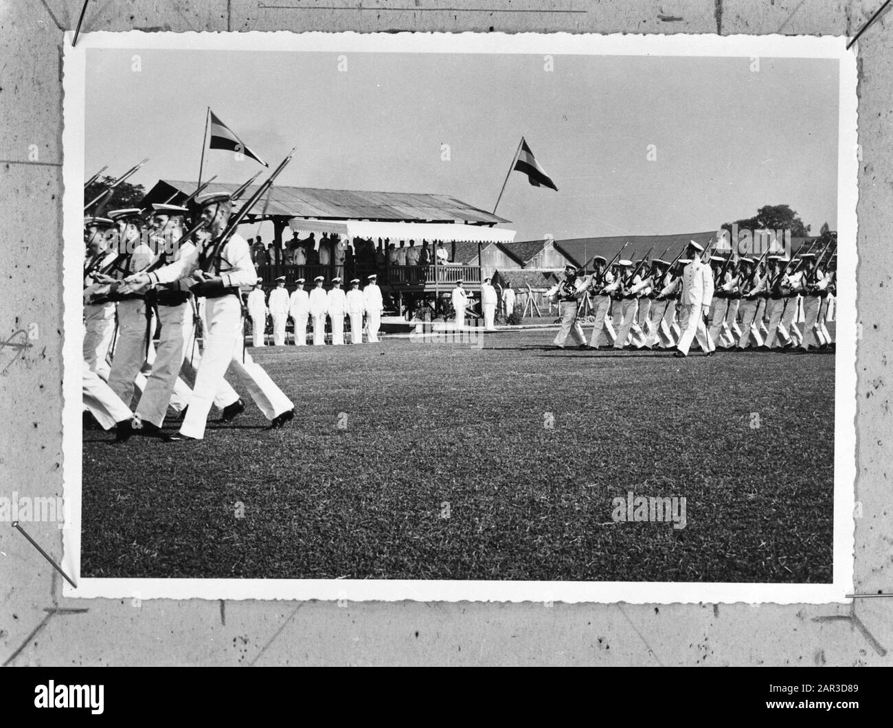 Marine parade in the Dutch East Indies. Section sailors during defilé ...