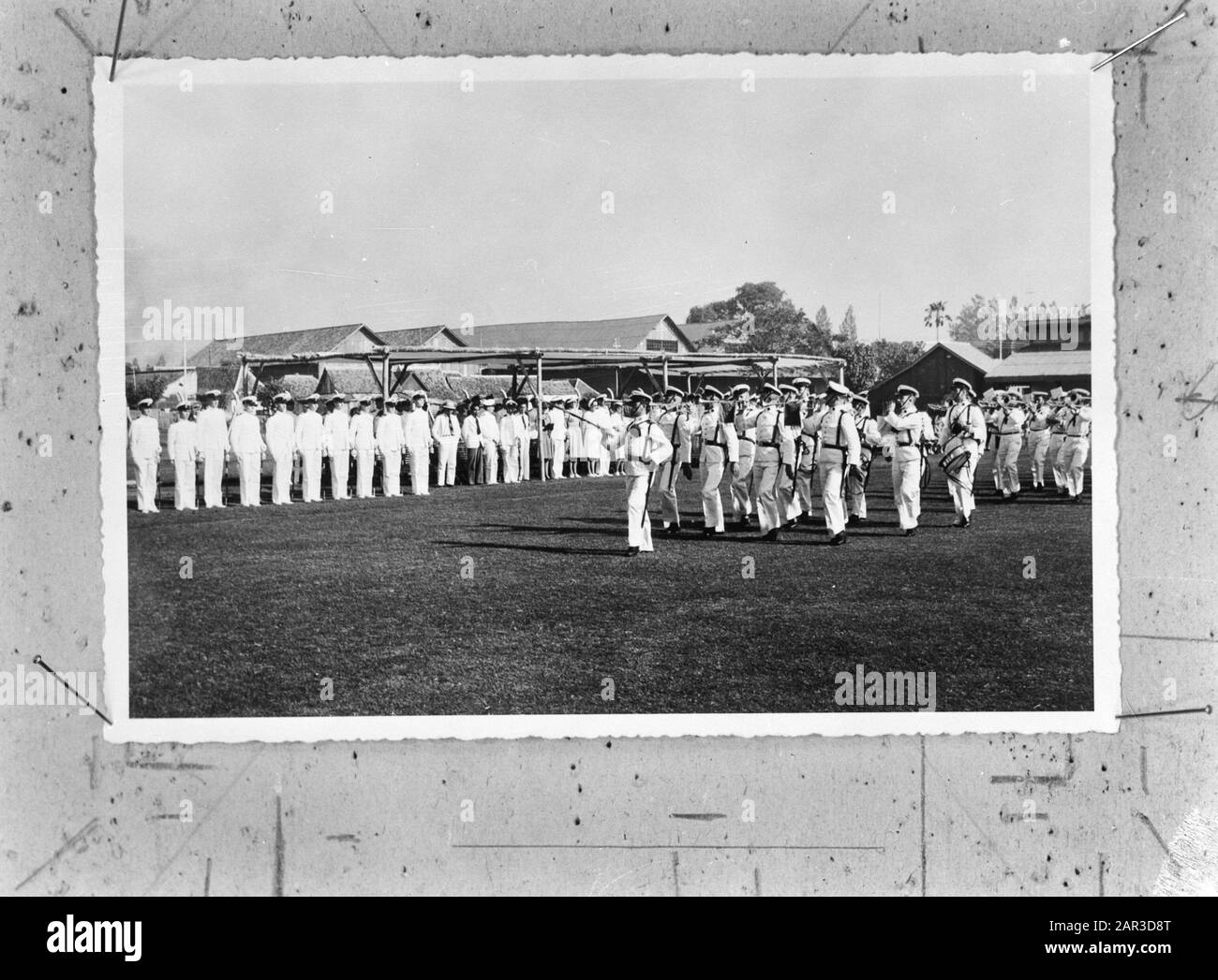 Marine parade in the Dutch East Indies. The claroon blowers, tamboers ...