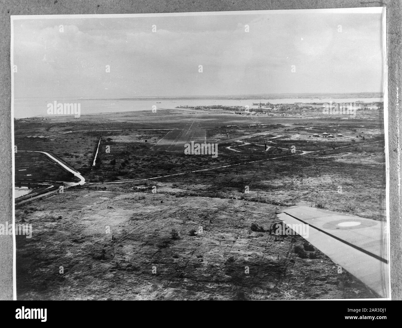 Aerial photograph of an airport by the sea Annotation: Repronegative ...