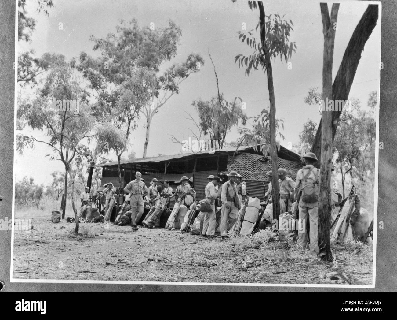 [A unit of soldiers with packing near a barn] Date: 1940-1945 Location ...
