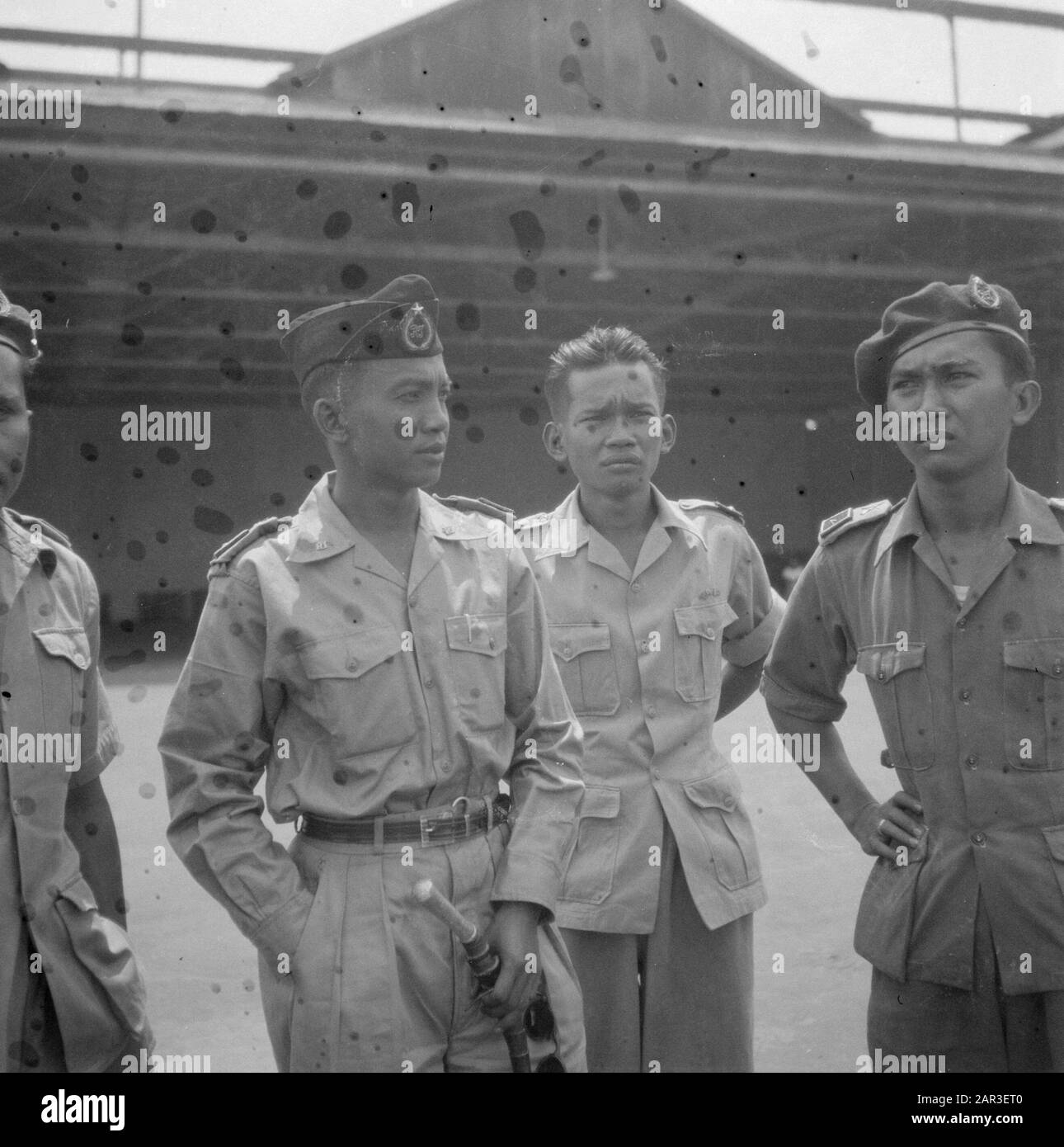 [Four officers of the TRI or TNI pose for a hangar] Annotation: See ...
