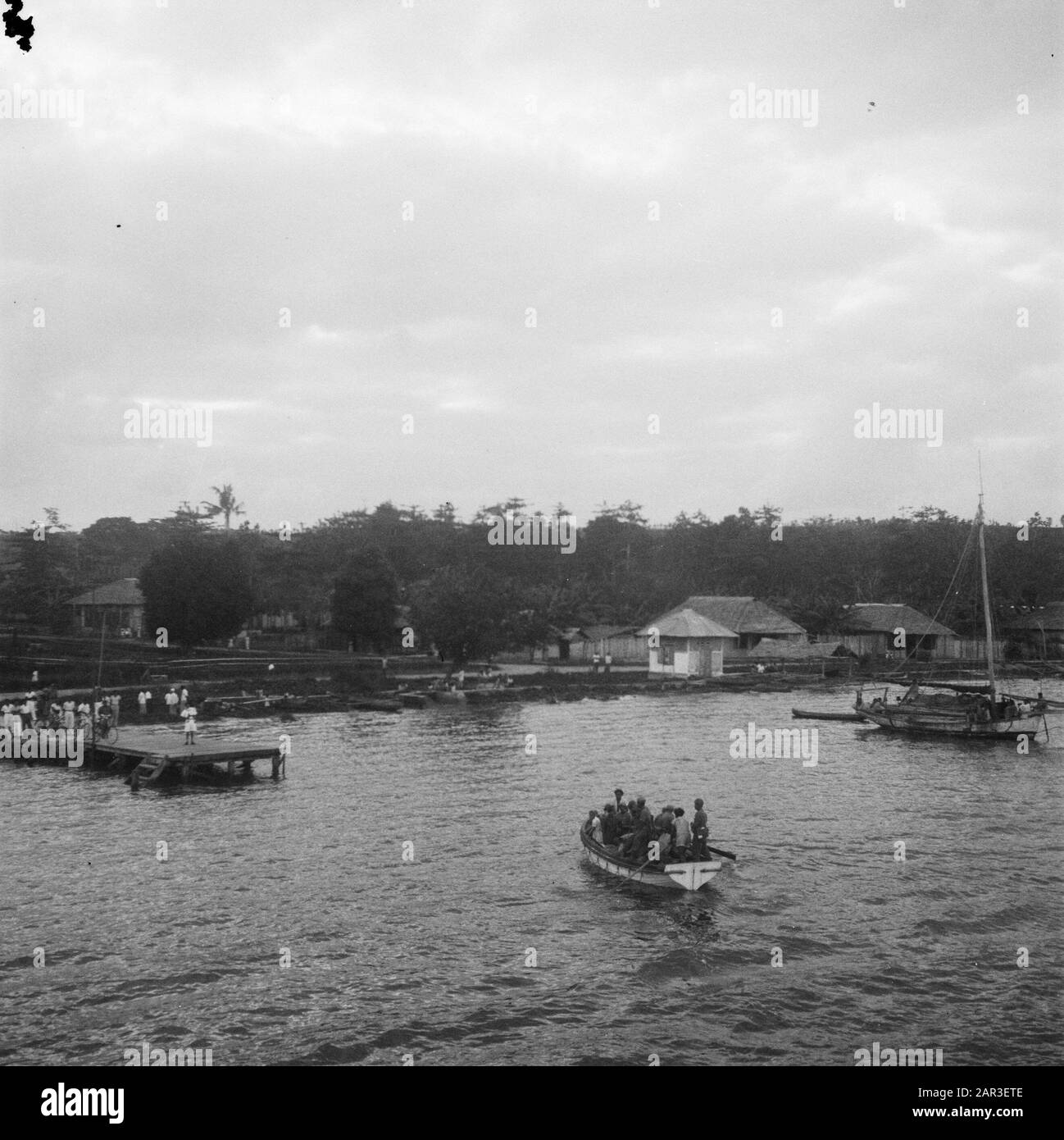 Namlea. Island of Buru. Moluccas. View of a jetty, and beach kampong ...