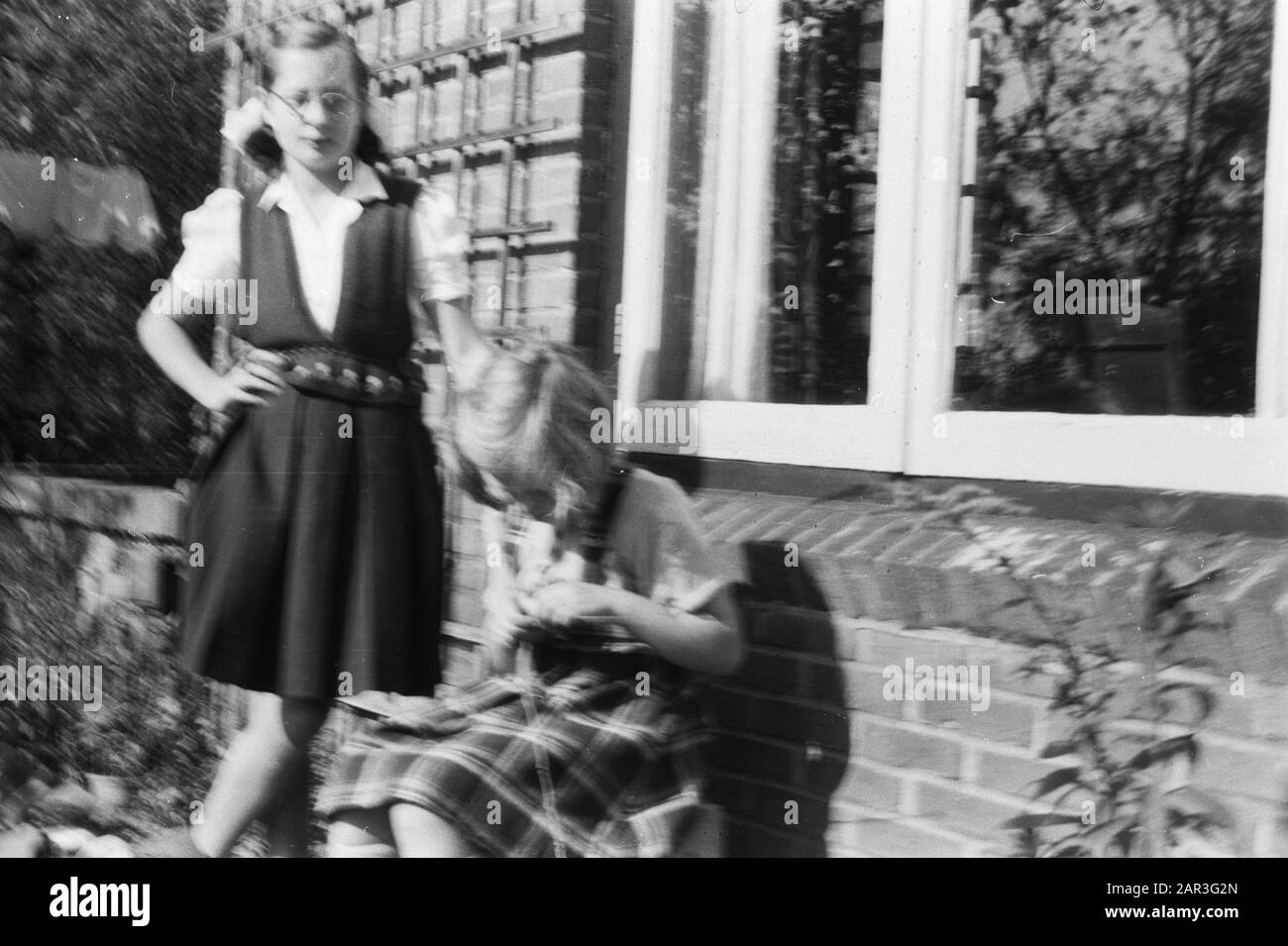 buildings, girls Date: 1950 Keywords: buildings, girls Stock Photo - Alamy