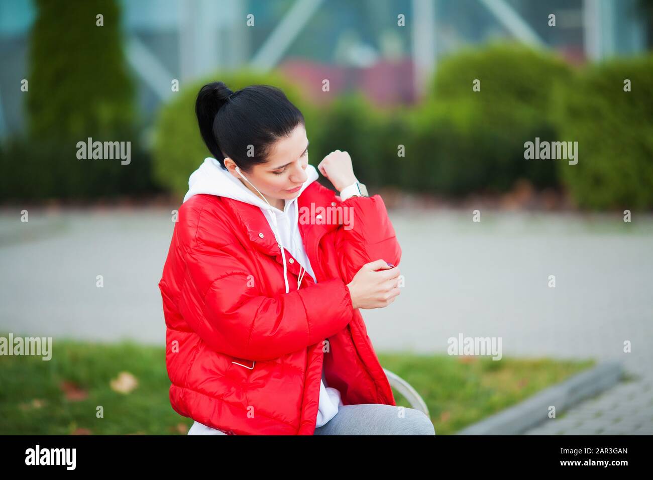 Fitness. Woman have accident injury and hurt at arms while workout at ...