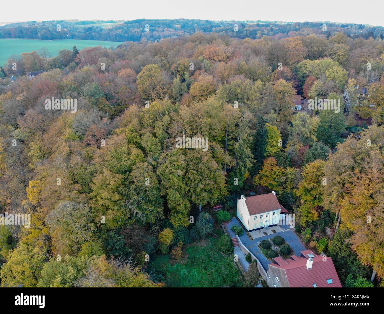 Aerial view of country side area with villas and garden surrounded by ...