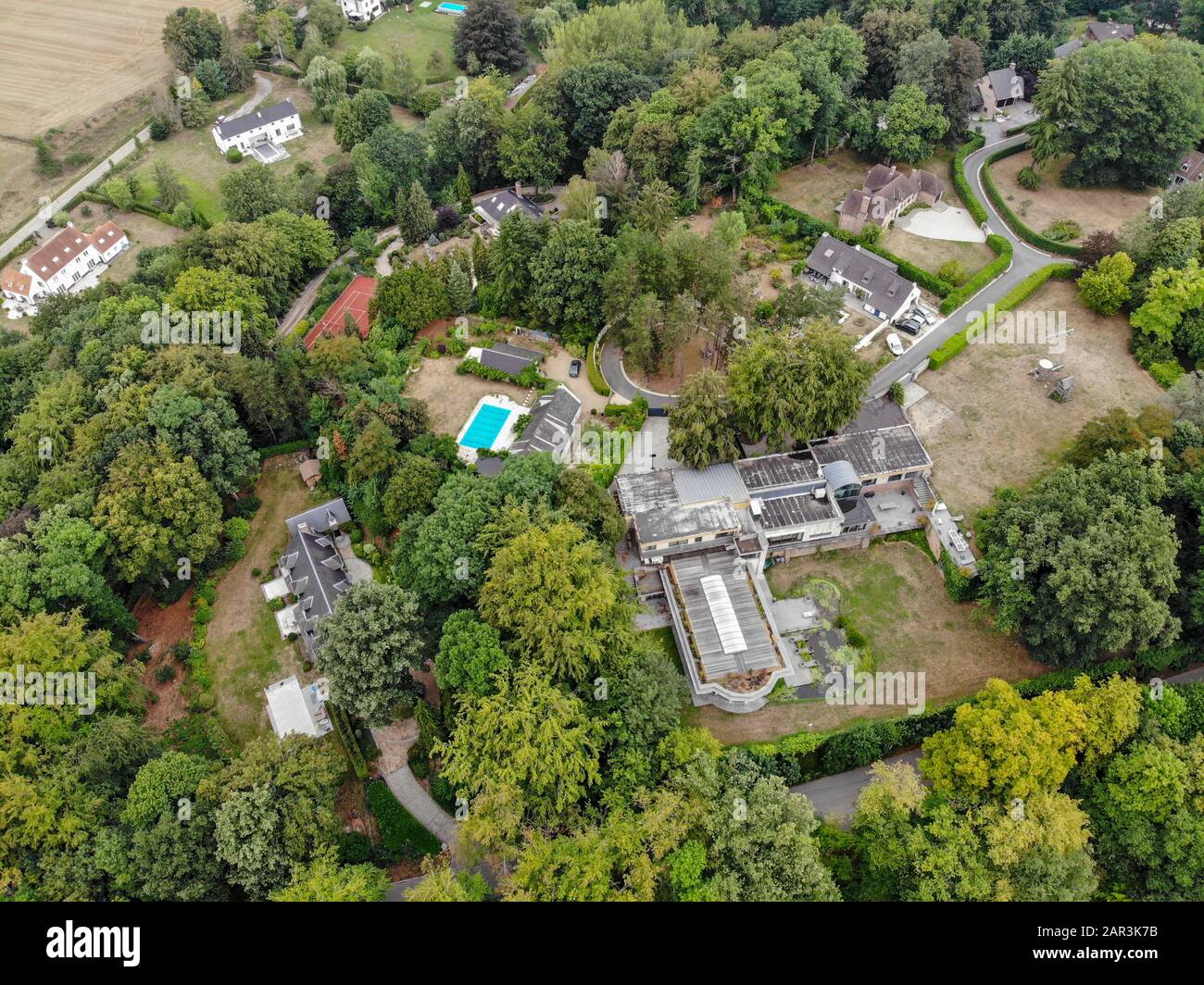 Aerial view of country side area with villas and garden surrounded by ...